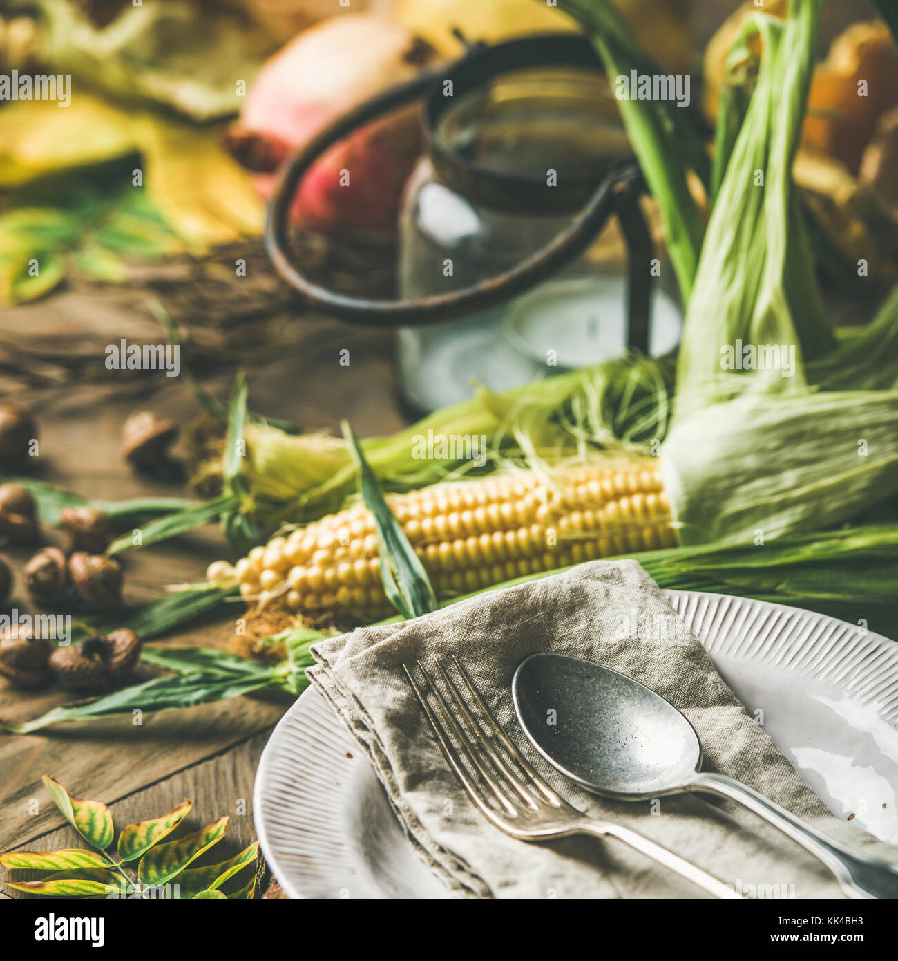 Fall table setting with vegetables for Thanksgiving day celebration ...