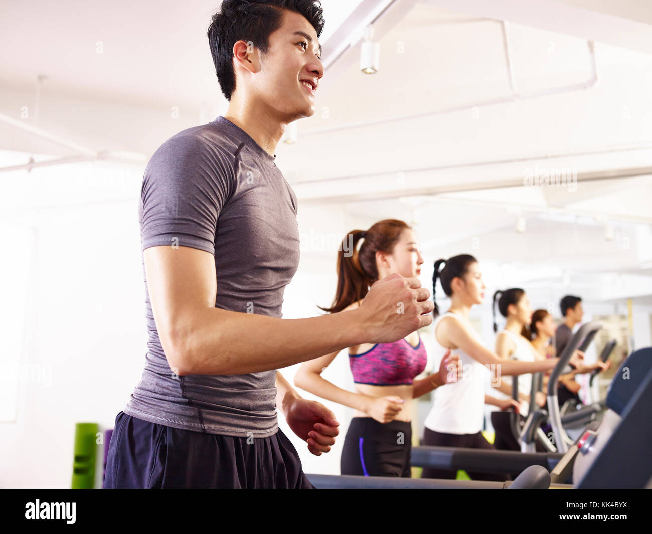 Woman walking on treadmill hi-res stock photography and images - Alamy