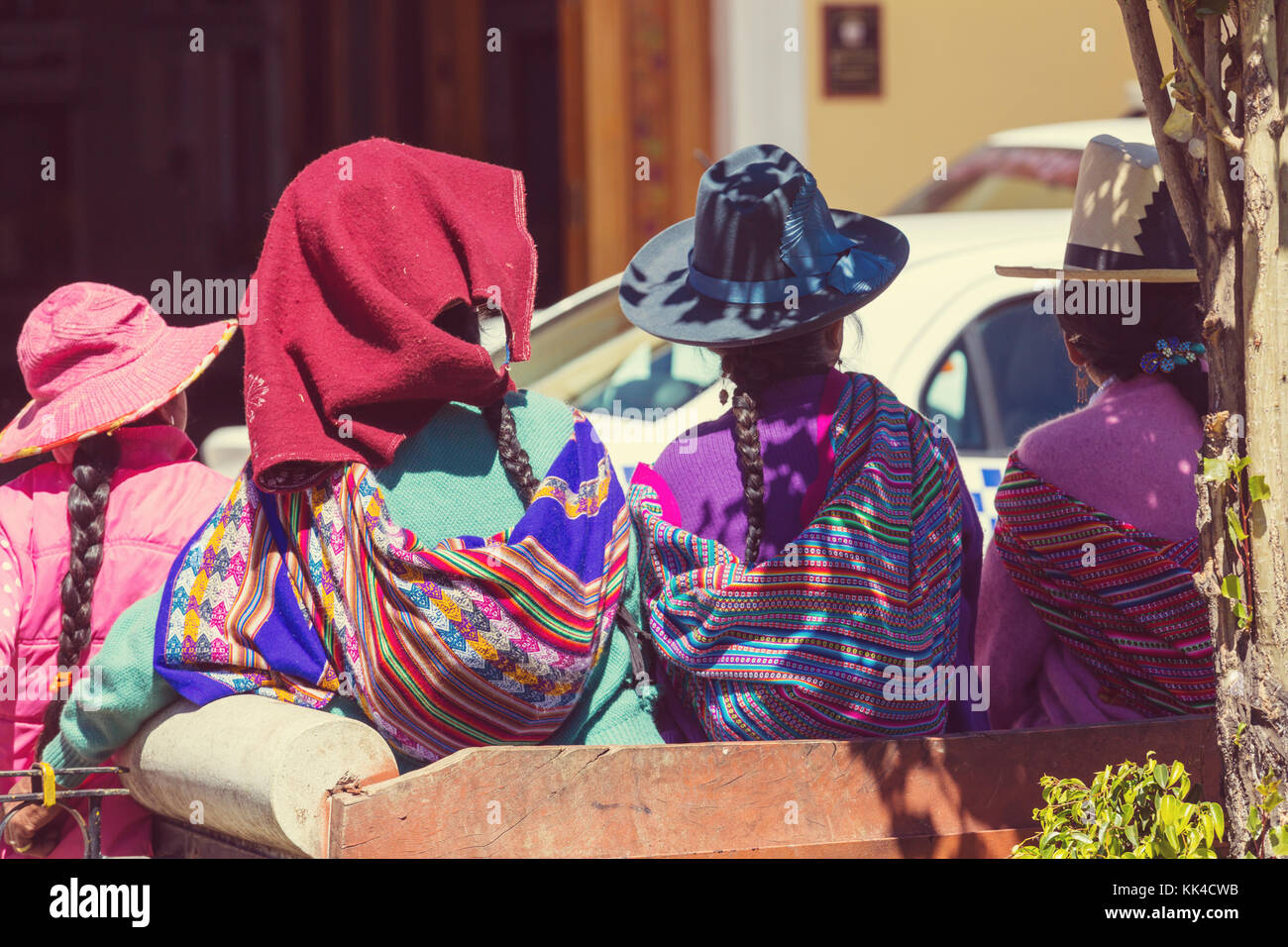 Peruvian people in city street Stock Photo - Alamy