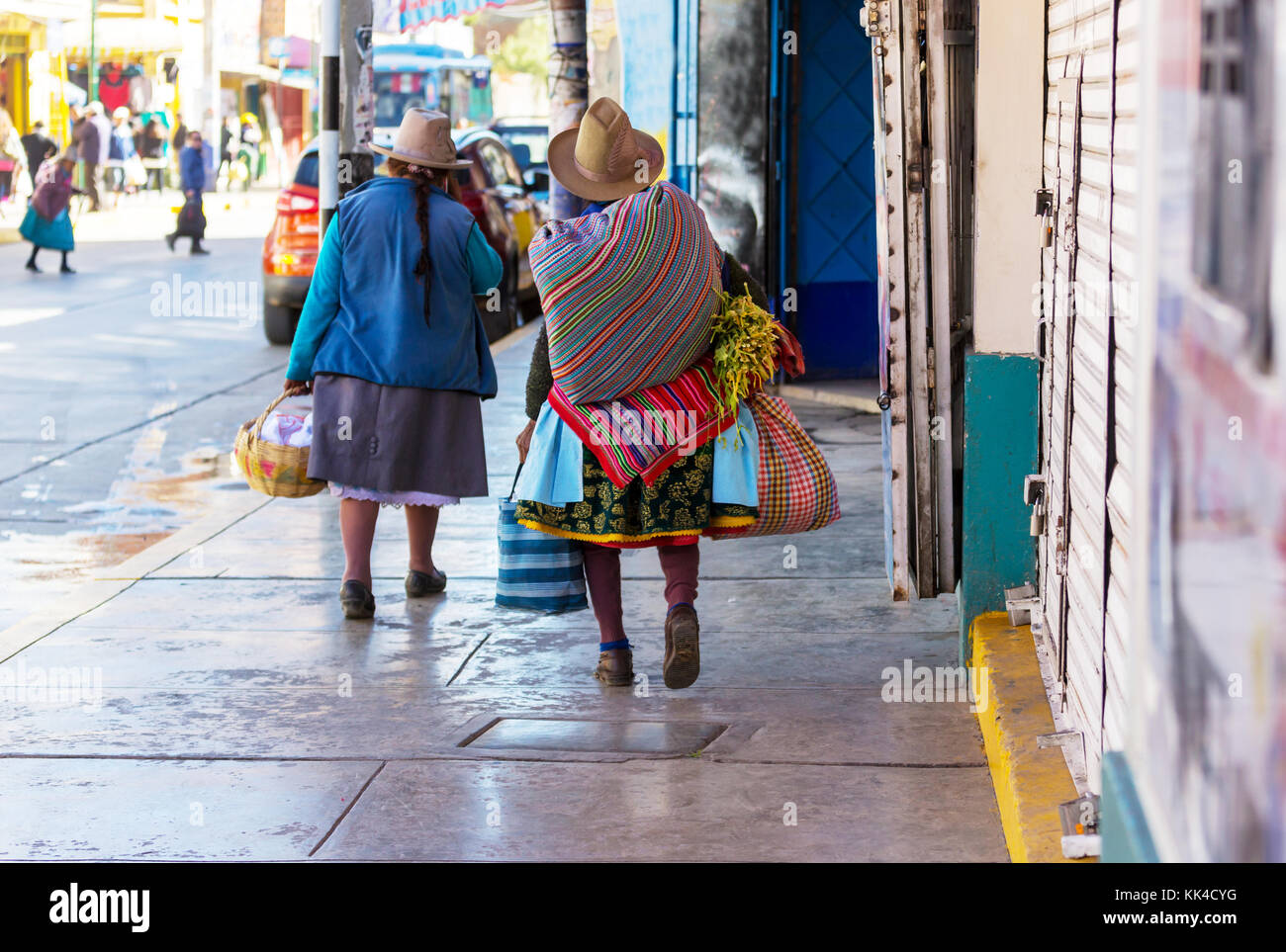 Peruvian people in city street Stock Photo - Alamy