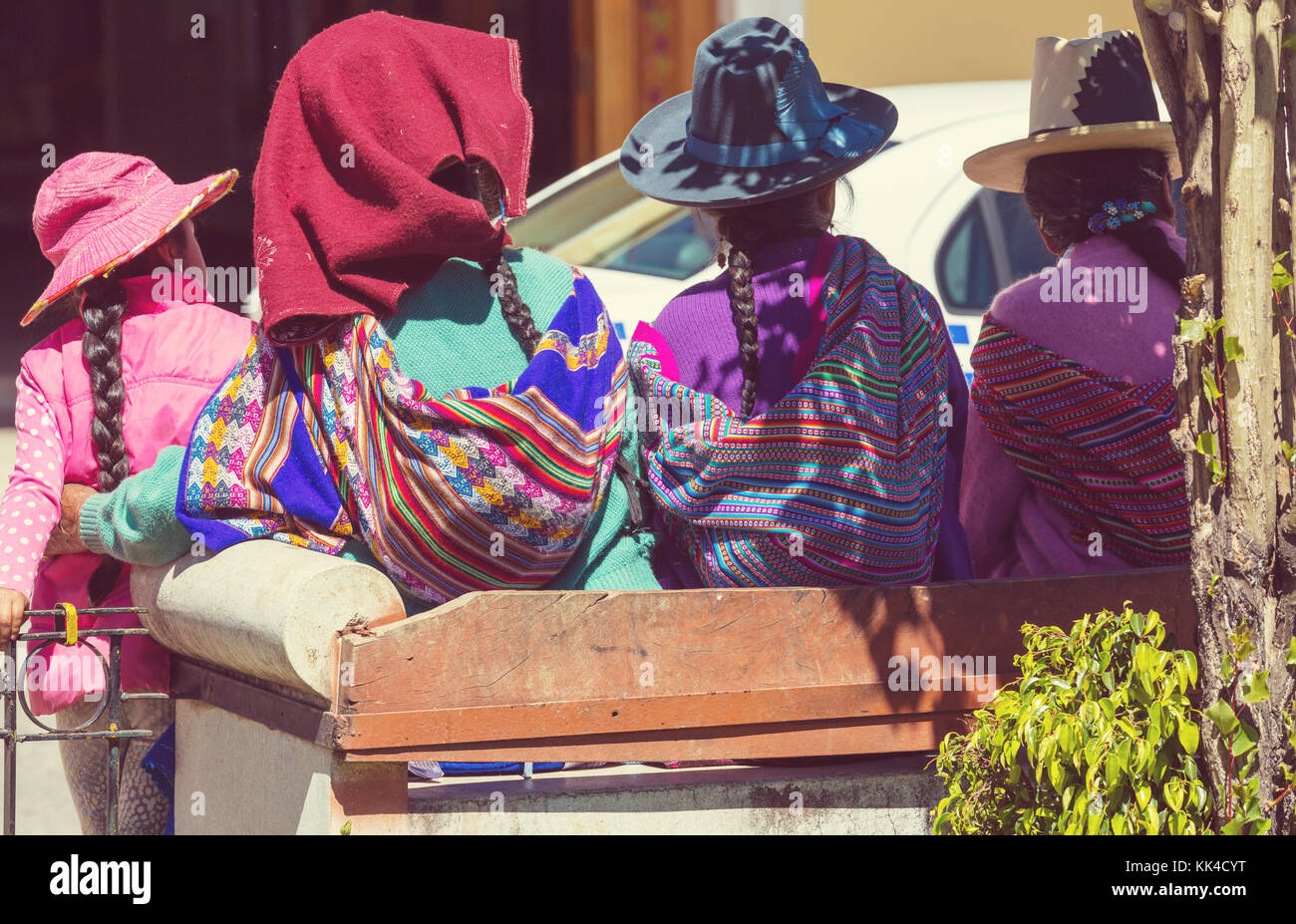 Peruvian people in city street Stock Photo - Alamy