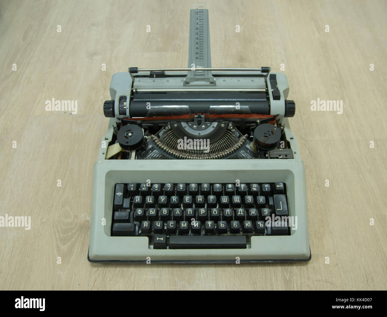 Vintage typewriter machine on wooden floor background Stock Photo - Alamy