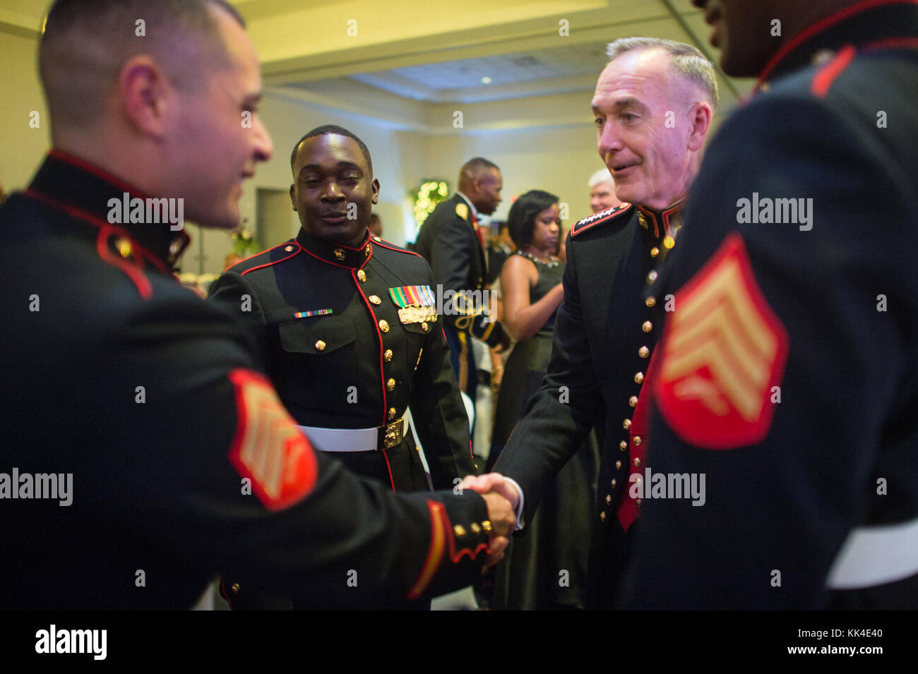 U.S. Marine Corps Gen. Joseph F. Dunford, Jr., chairman of the Joint Chiefs of Staff, greets ...