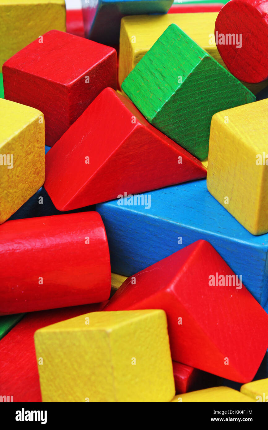 Wooden toy block background. Red, Blue, Yellow Green Wooden toy blocks ...