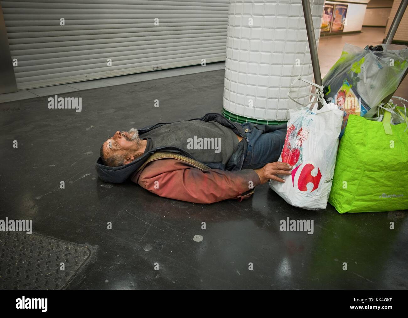 Homeless sleeping in the metro hi-res stock photography and images - Alamy