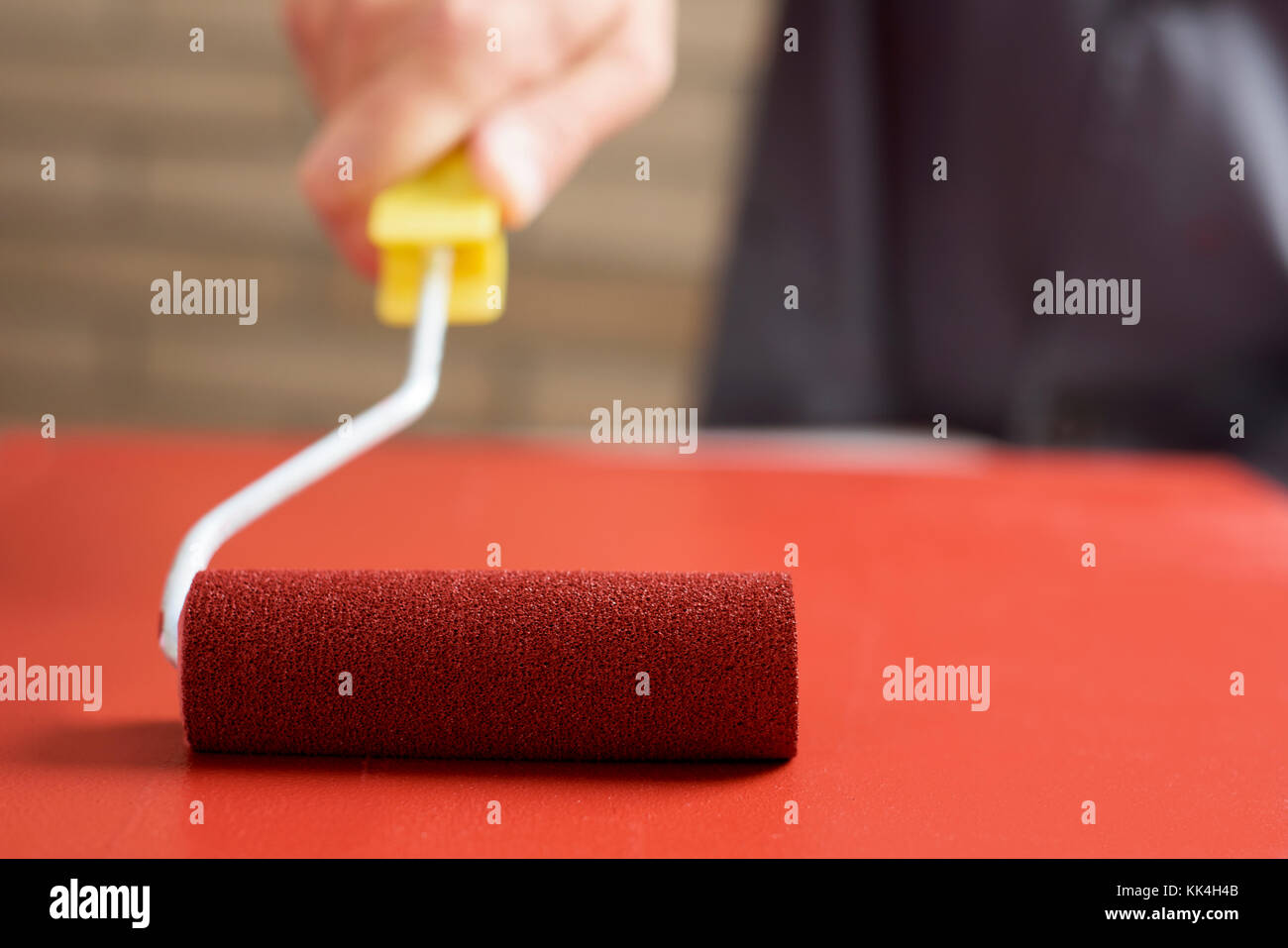 Man in the red coat painting hi-res stock photography and images - Alamy