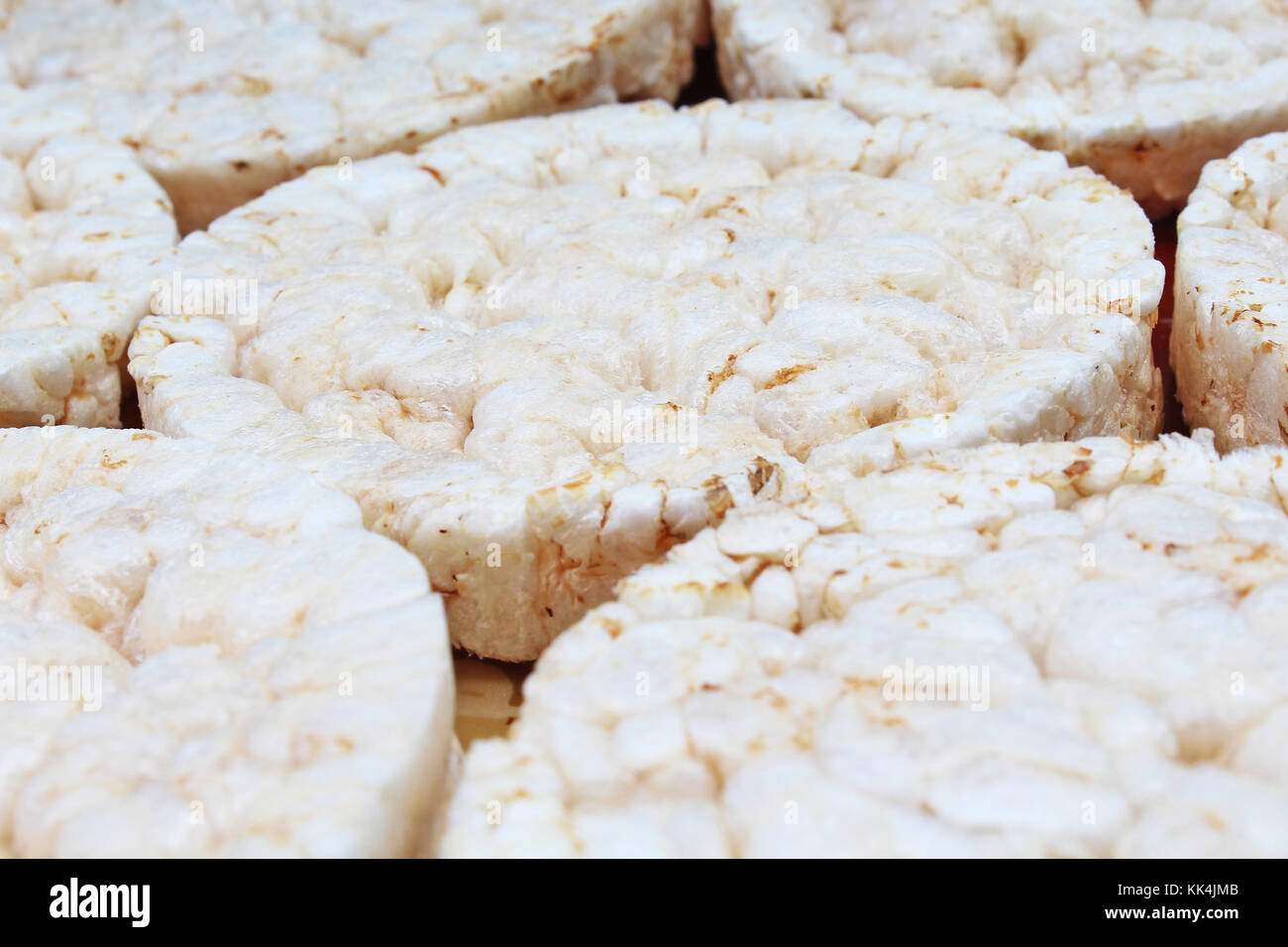 Stack of puffed whole grain crispbread. Rice cake puffed rice texture ...