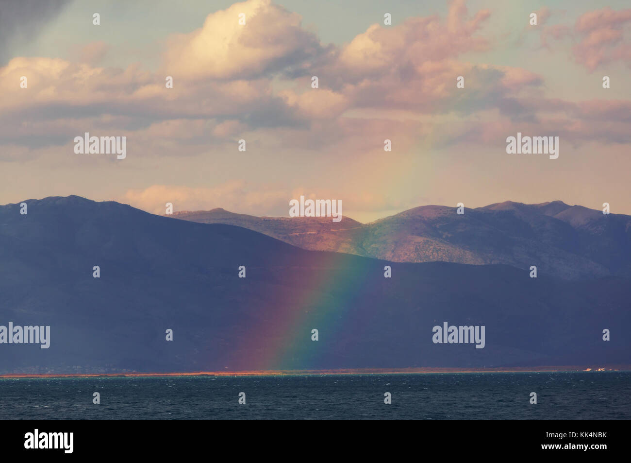 Rainbow above mountains, Alaska Stock Photo - Alamy