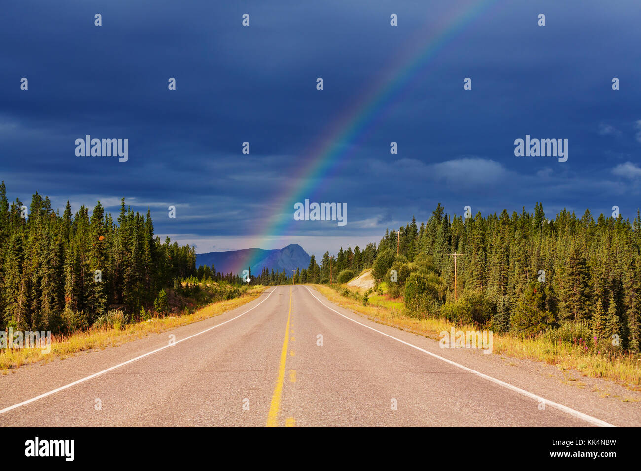 Rainbow above mountains, Alaska Stock Photo - Alamy