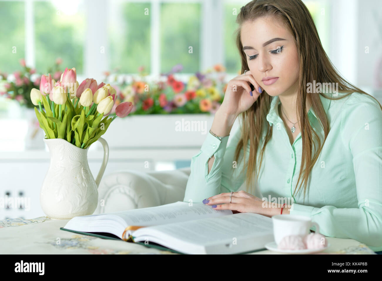 woman reading interesting book Stock Photo - Alamy