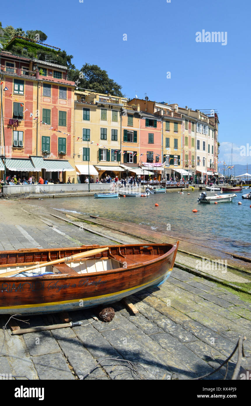 Italy; Liguria: Portofino. Wooden boat in dry dock and sailboats in the ...