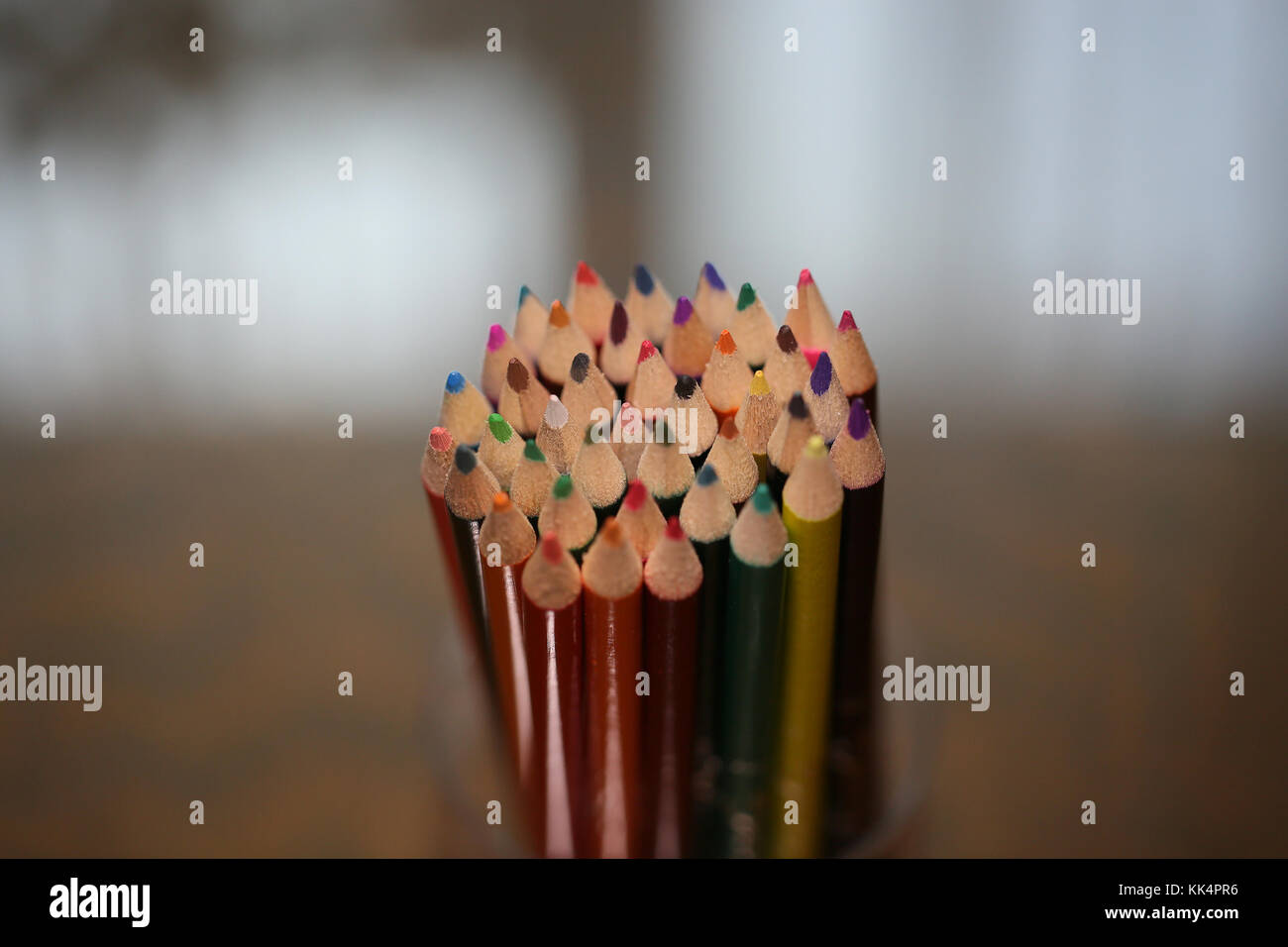 Multicolored pencils on the table. A stack of colored pencils ti Stock ...