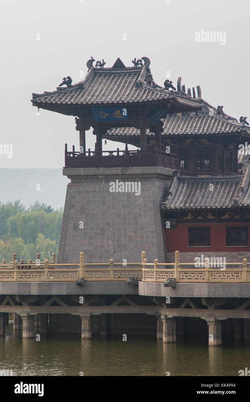 Centuries old, ancient chinese watchtower on a lake Stock Photo - Alamy