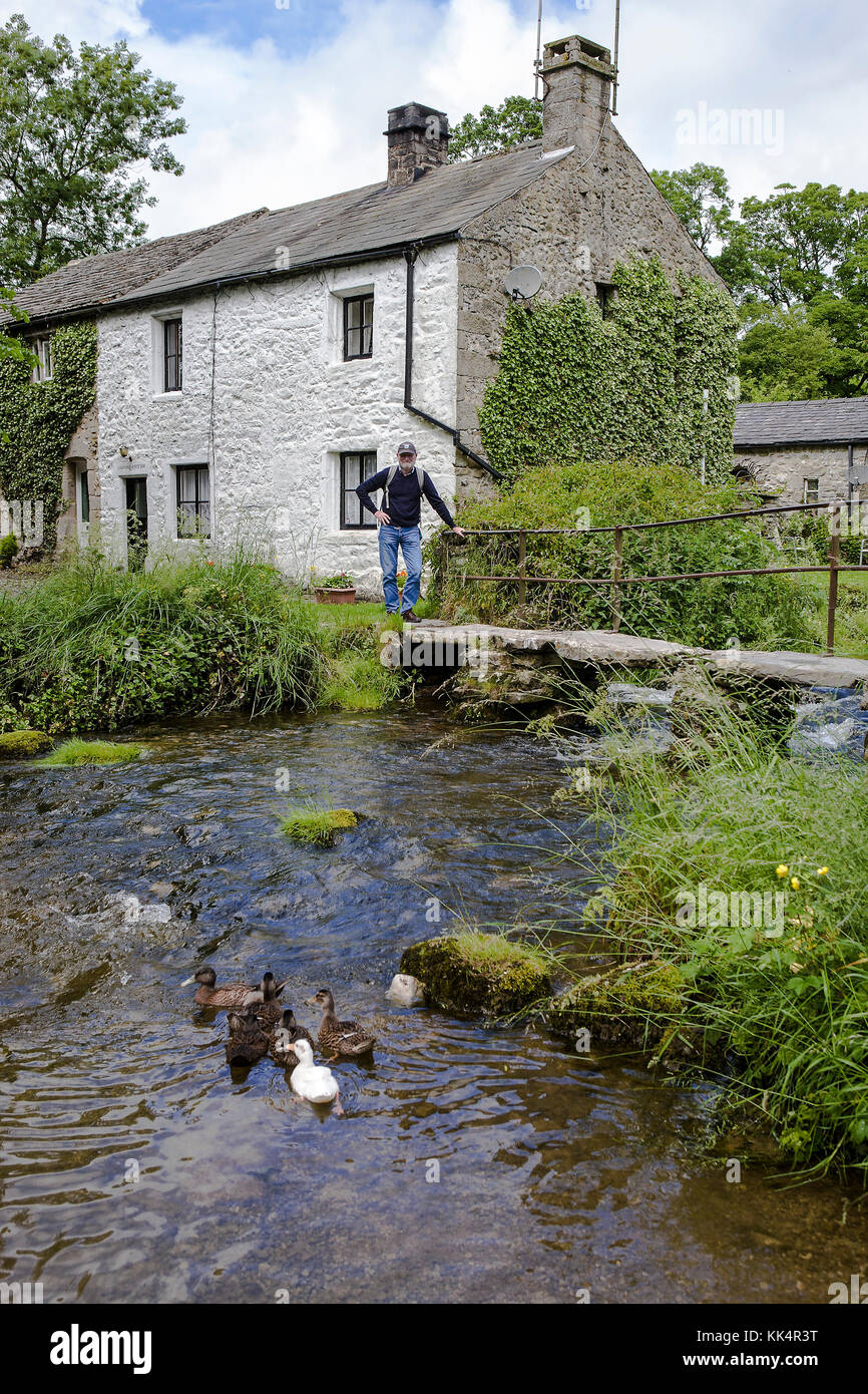 Clapper bridge over Malham Beck, Malham, North Yorkshire, England, UK ...