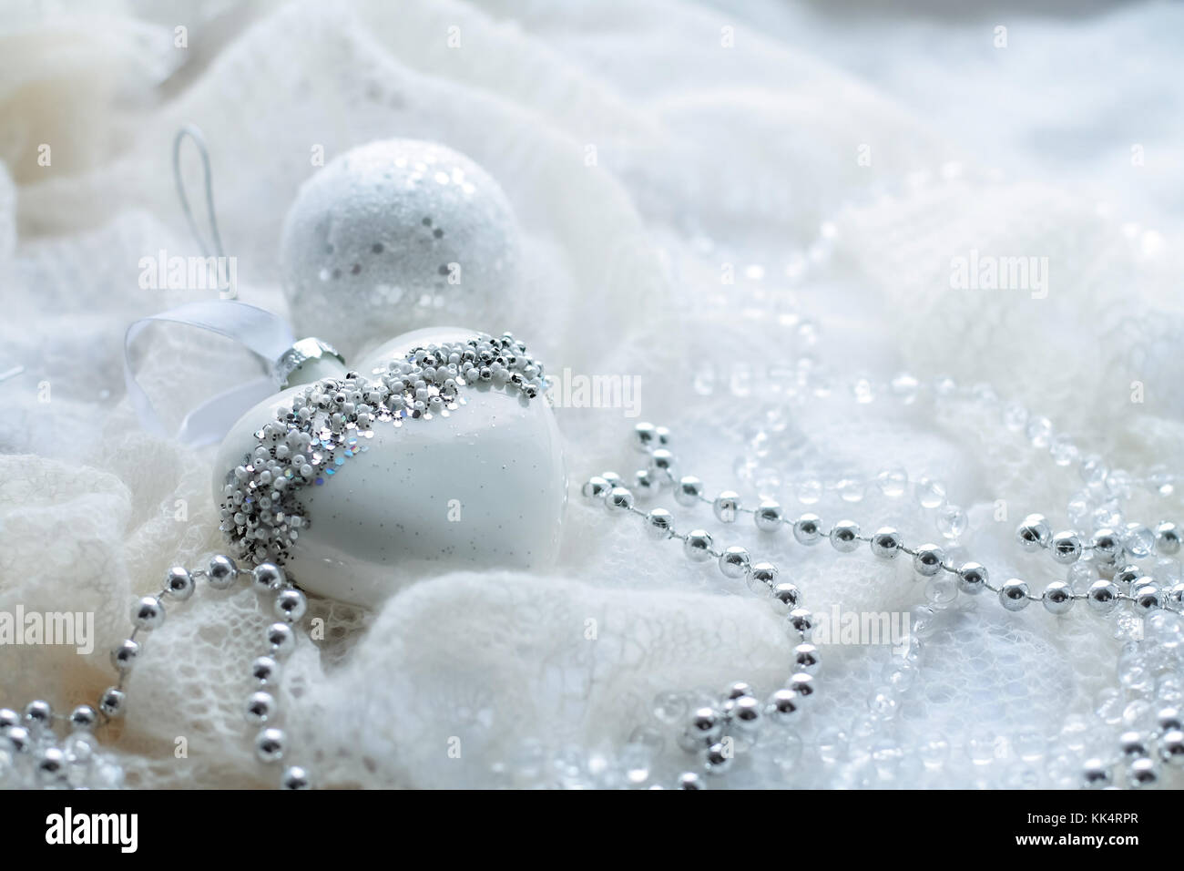 Christmas toys and balls to knit the scarf. Decorations on holid Stock ...