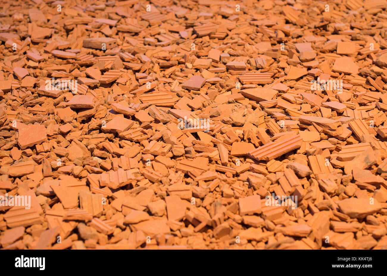 A lot of broken red bricks Stock Photo - Alamy