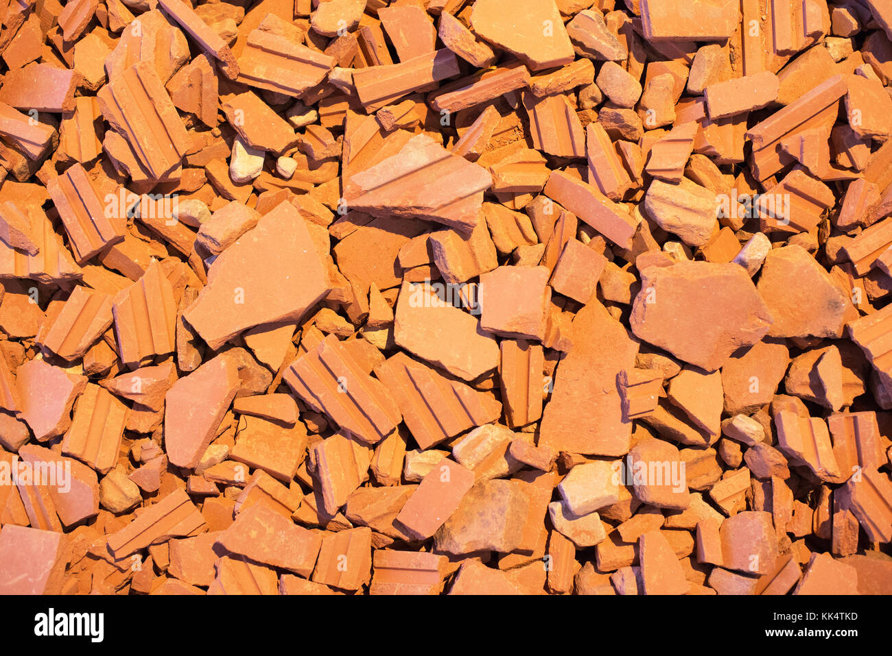 A lot of broken red bricks Stock Photo - Alamy