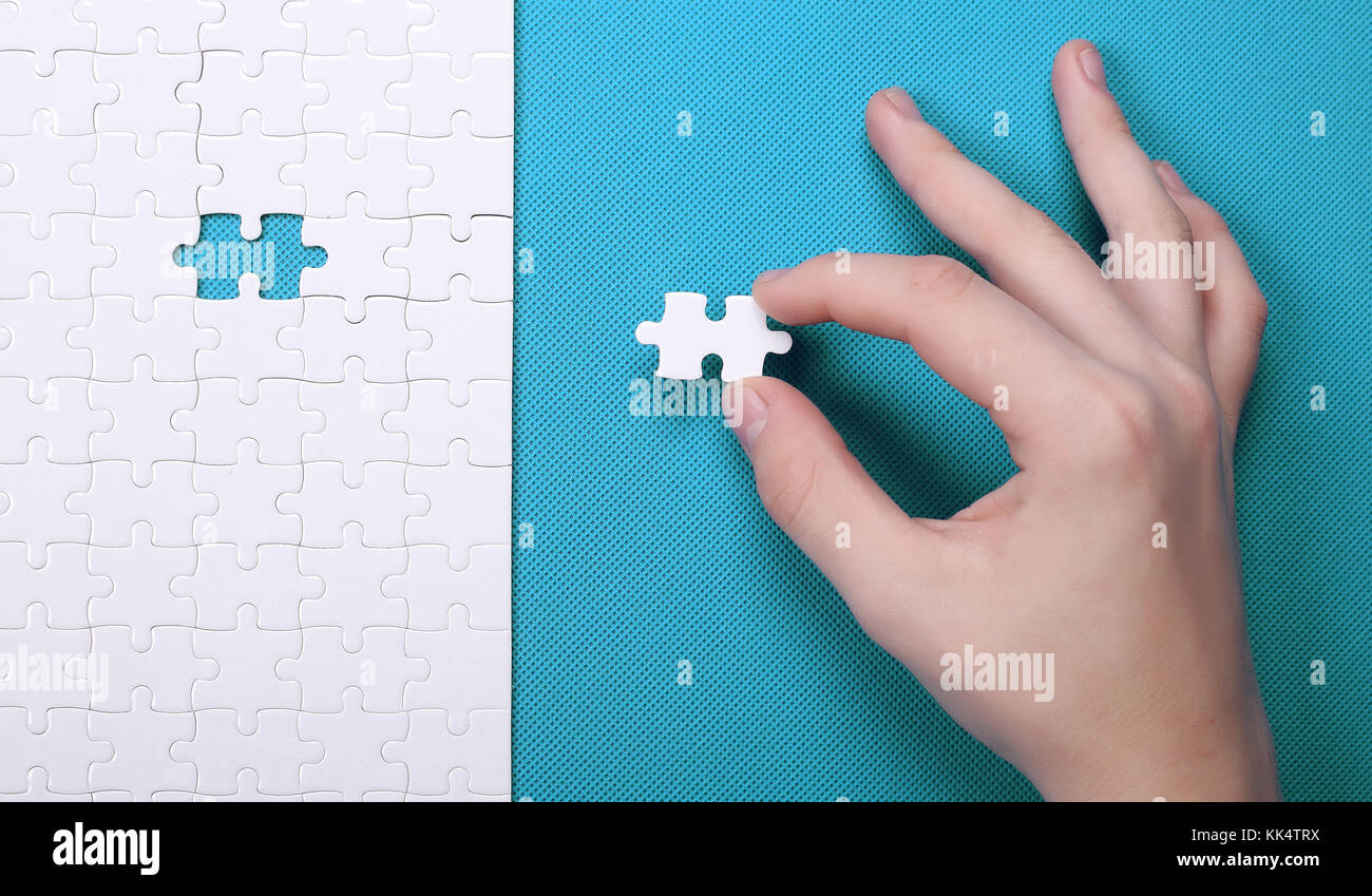White details of a puzzle on green background. A puzzle is a puz Stock ...
