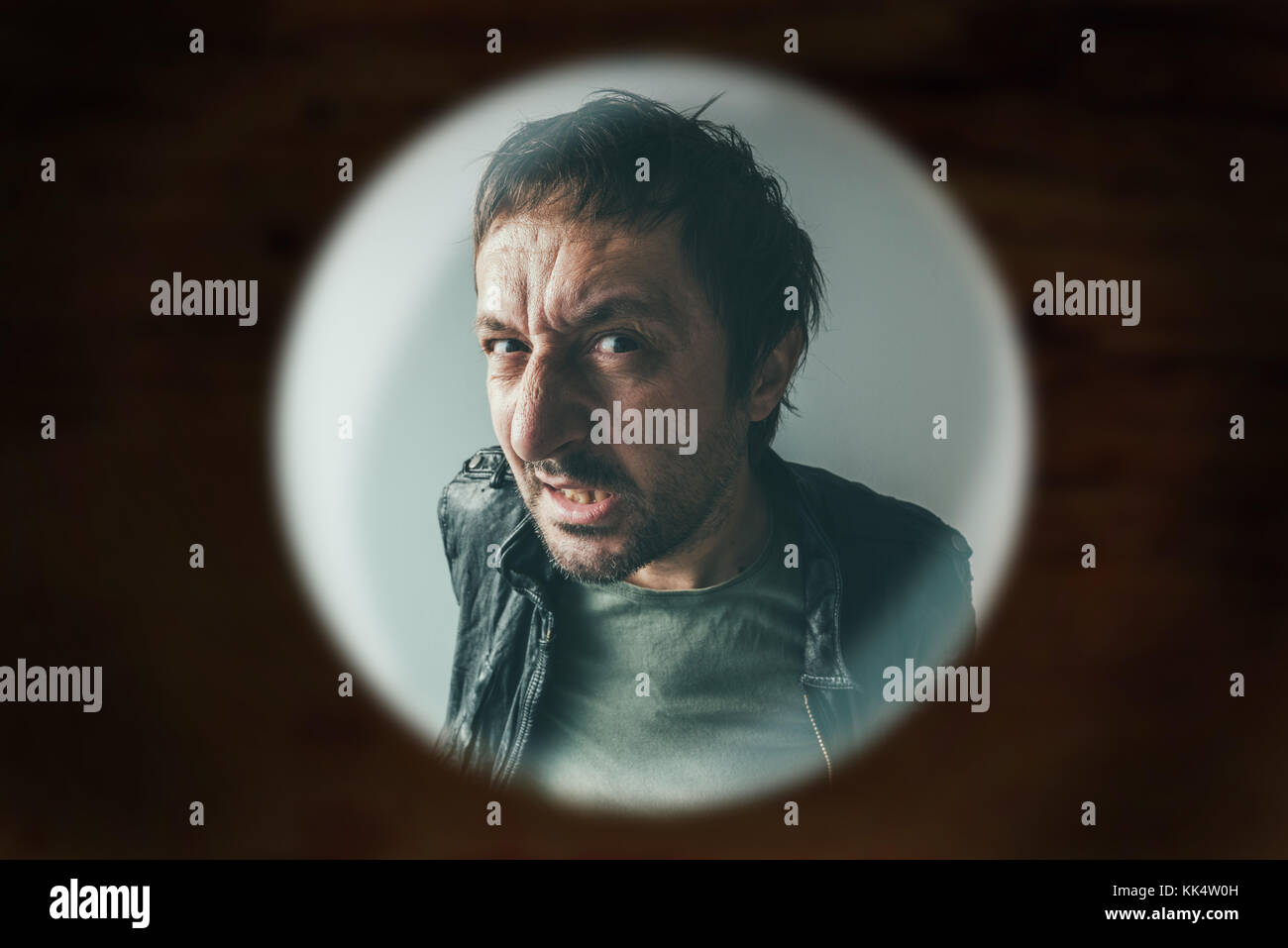 Man Through Door Peephole High Resolution Stock Photography and Images ...