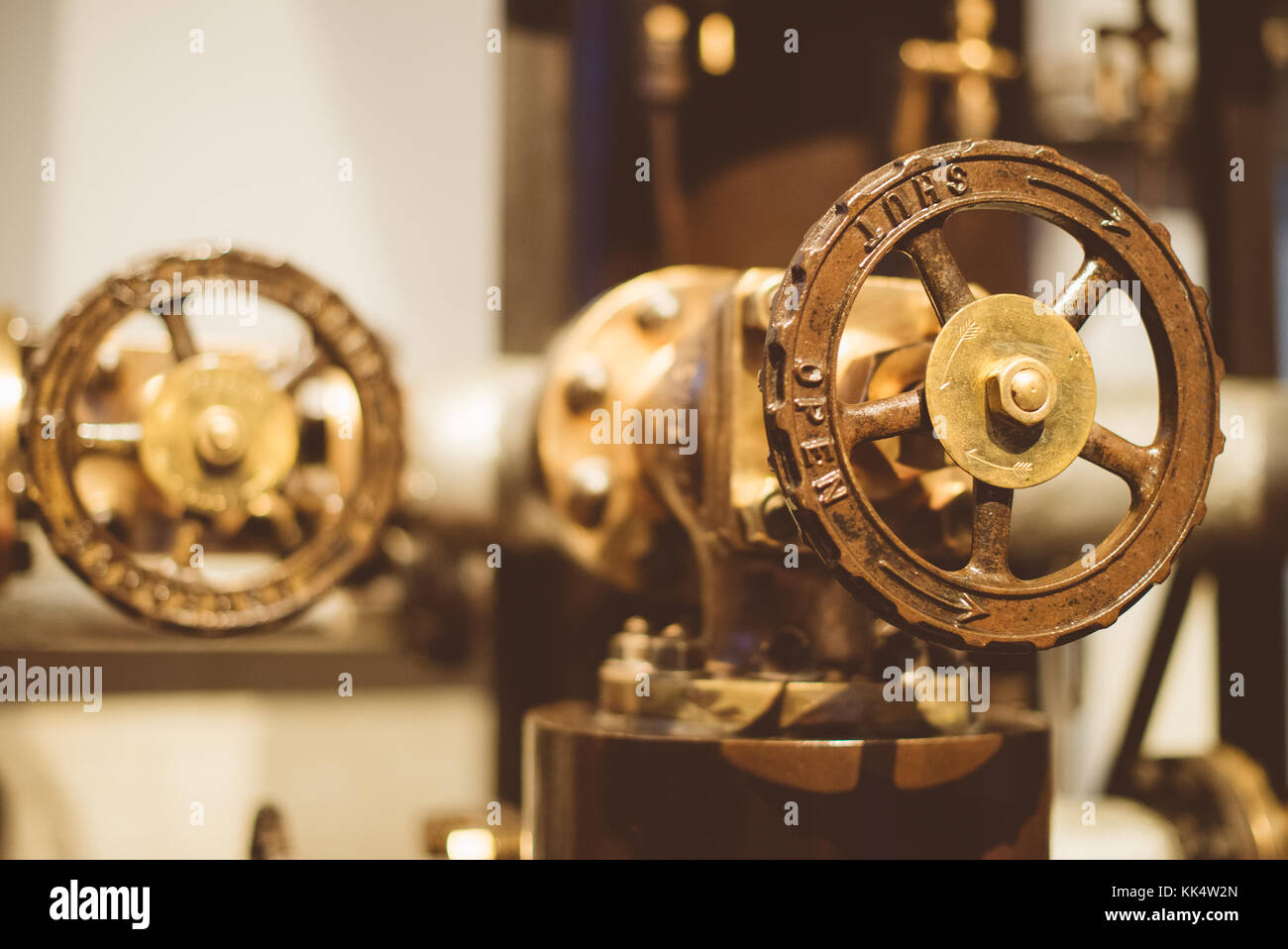 Gold Valve. Part of old power plant Stock Photo - Alamy