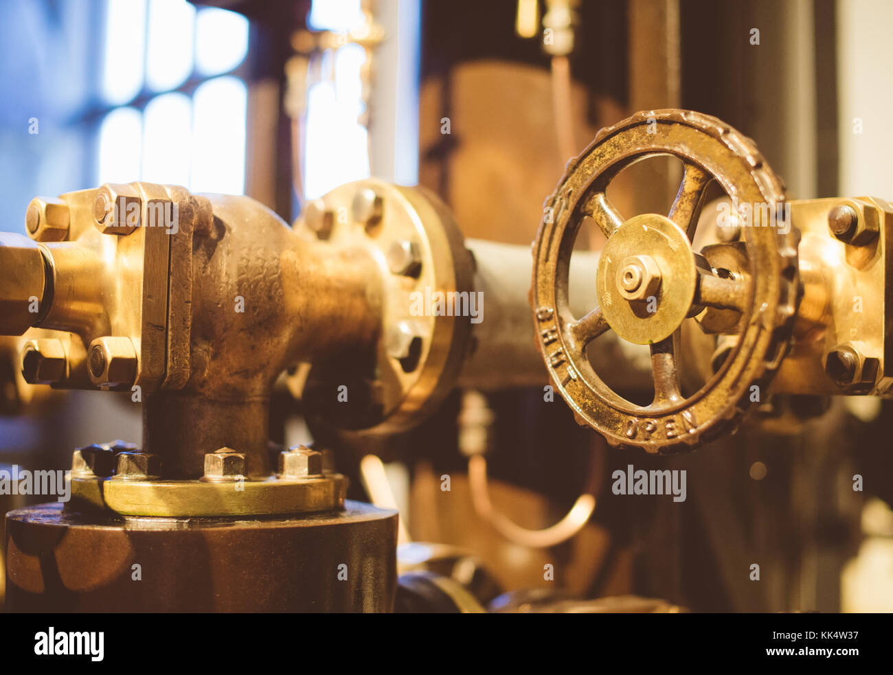 Gold Valve. Part of old power plant Stock Photo - Alamy
