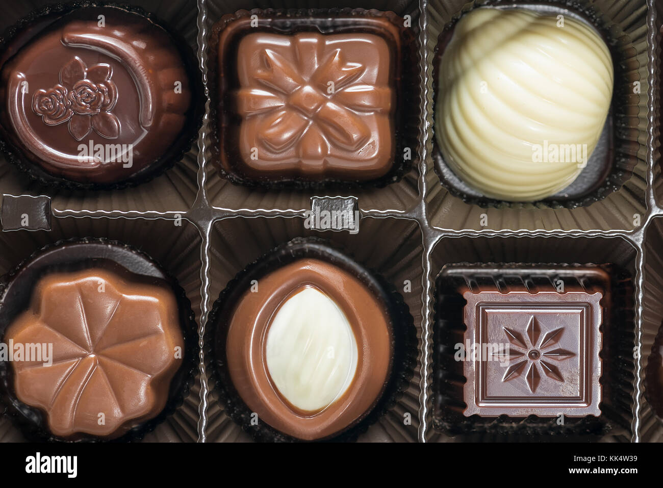 Assorted chocolates close up Stock Photo - Alamy
