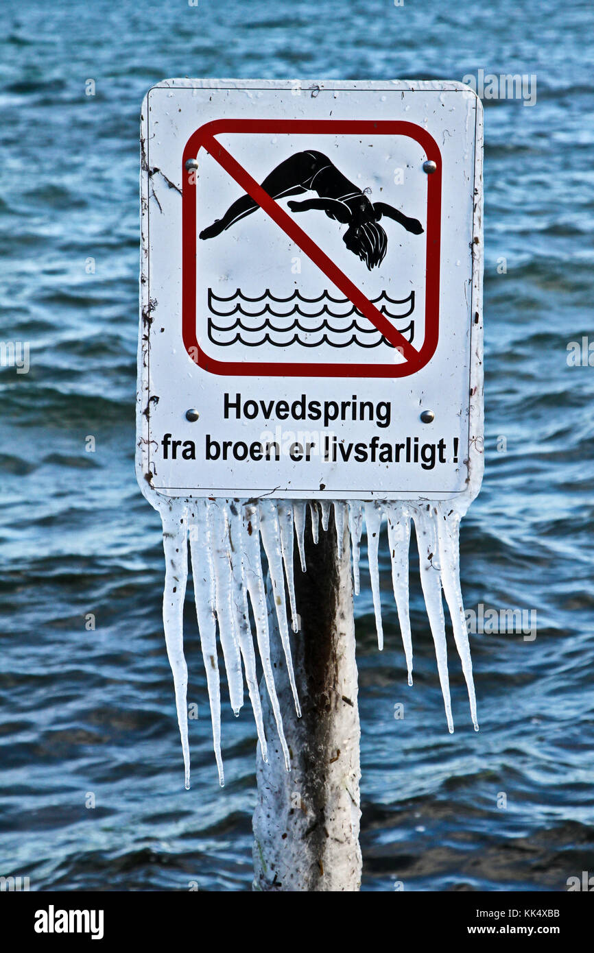 sign showing that jumping in water is forbidden Stock Photo - Alamy