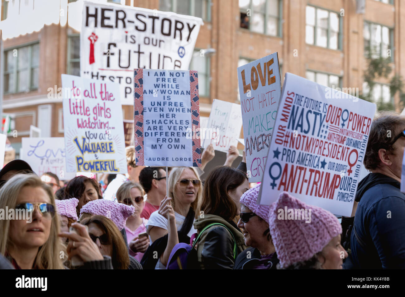 Protesters march in downtown Los Angeles at the Women's March in ...