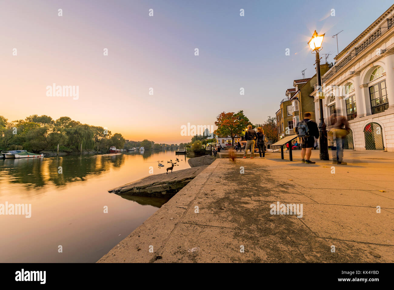 Richmond riverside path during sunset in London Stock Photo - Alamy