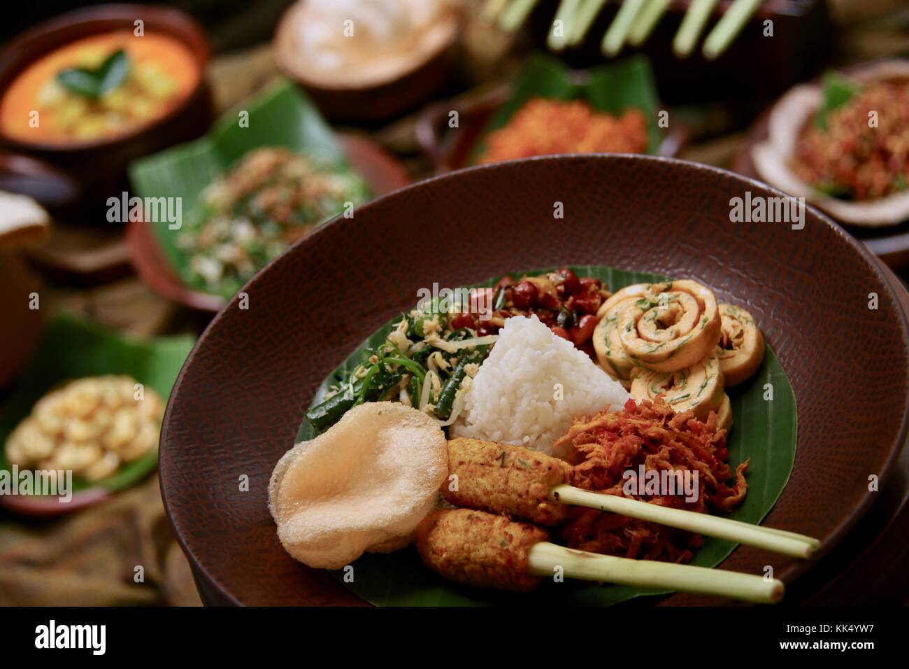 Nasi Campur Bali. Popular Balinese rice dish of steamed rice with ...
