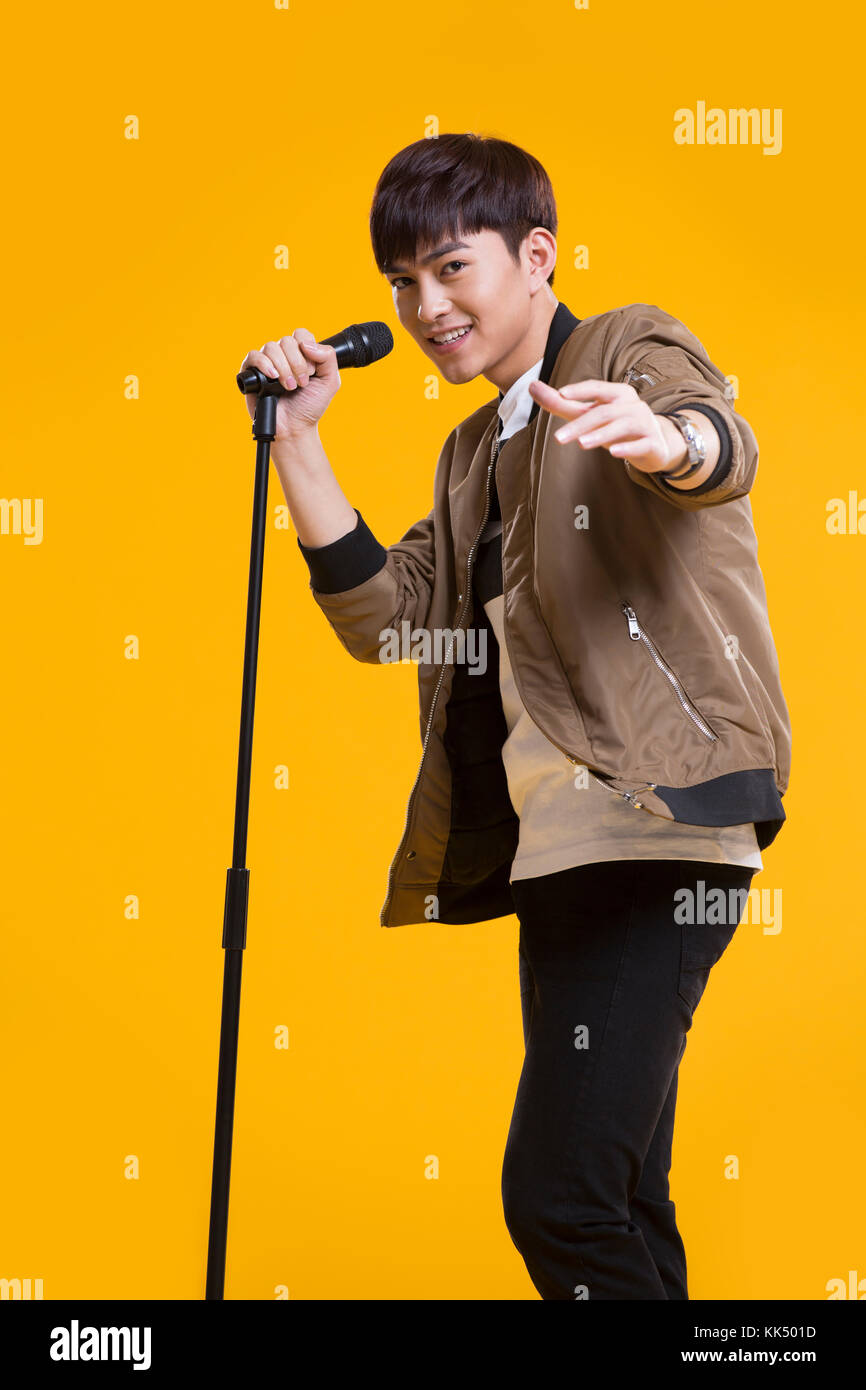 Asian man singing hi-res stock photography and images - Alamy