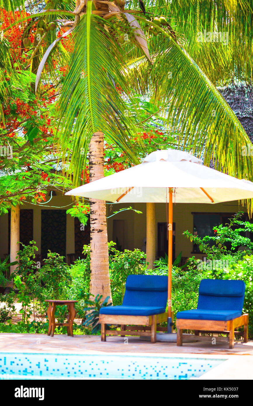 Beautiful luxury landscape around pool in hotel resort Stock Photo - Alamy