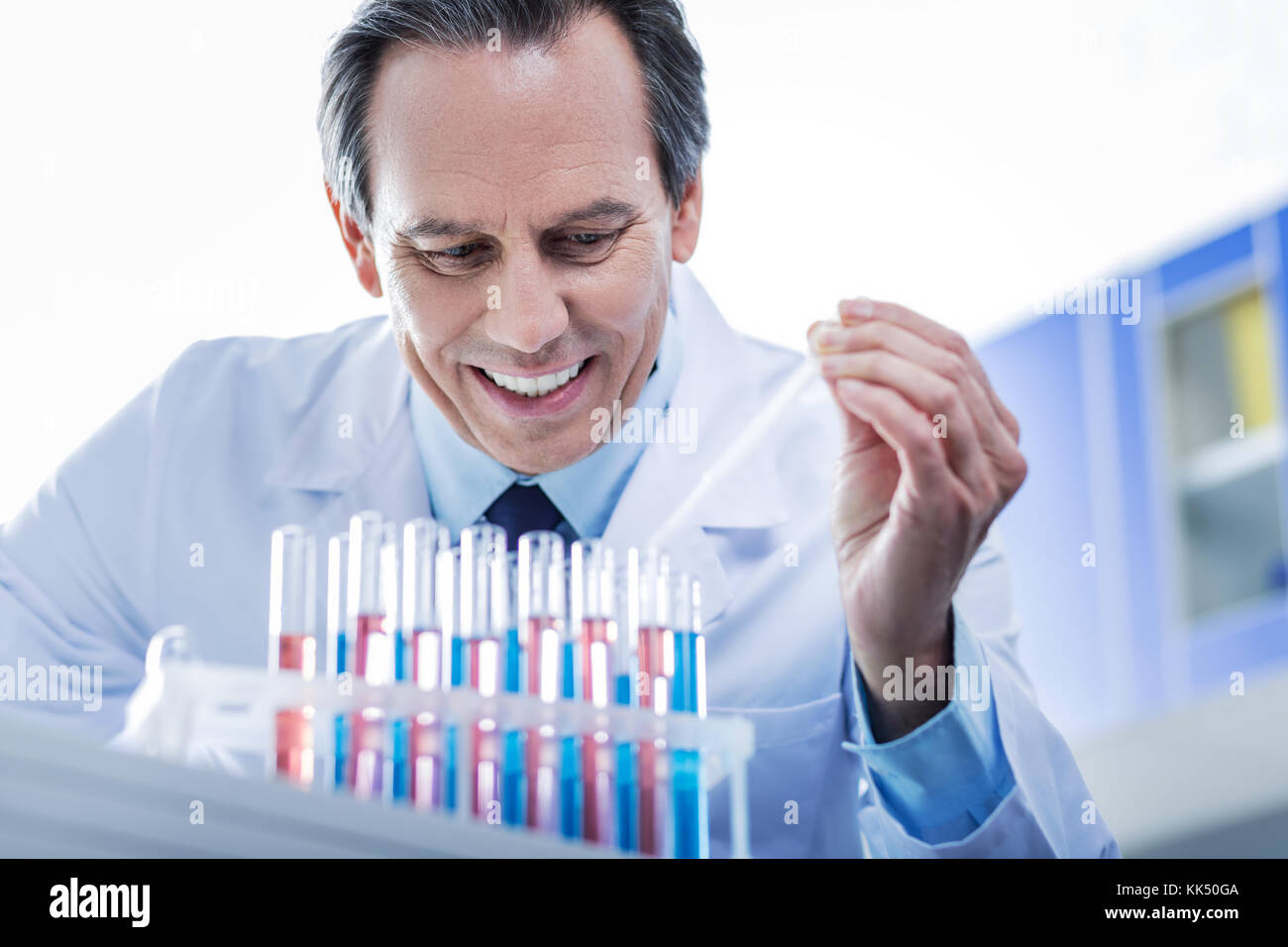 Positive delighted scientist being happy about his research Stock Photo ...