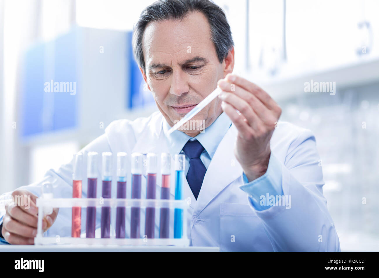 Serious professional biologist working with samples Stock Photo - Alamy