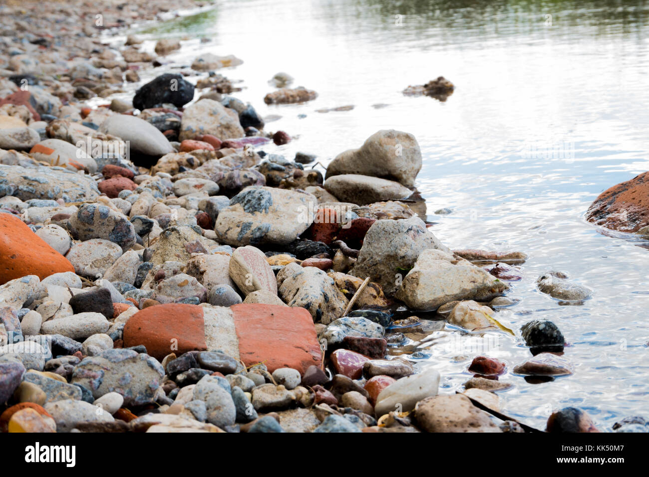 Beautiful pattern of rocks, stones in the water Stock Photo - Alamy