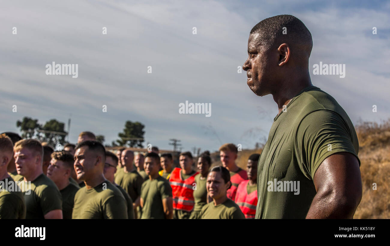 Marine and Sailors listen to Col. Dawn R. Alonso, commanding officer of ...