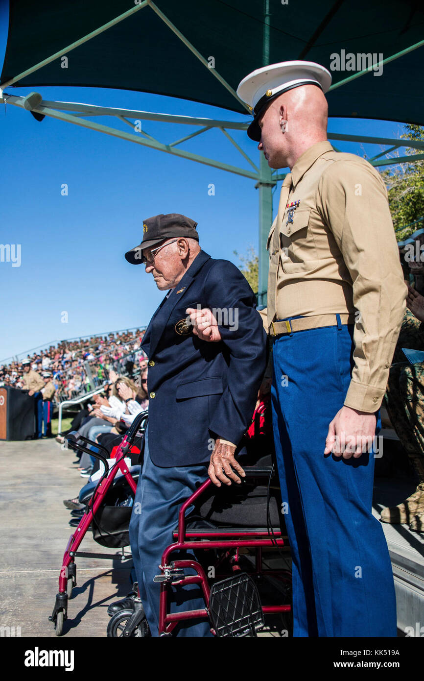 Retired Marine Corps Sgt. Maj. Ray V Wilburn, stands in recognition of ...