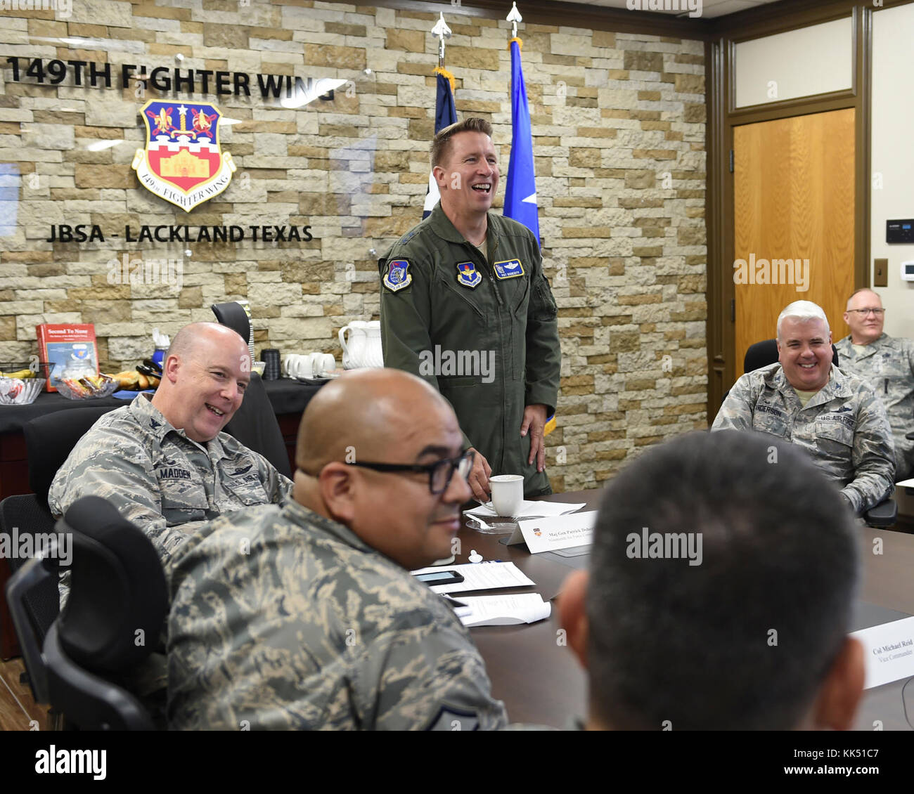 Maj. Gen. Patrick Doherty, 19th Air Force commander, jokes with members ...