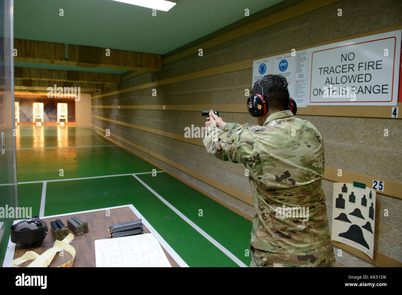 A U.S. Soldier with the 650th Military Intelligence Group shoots with ...