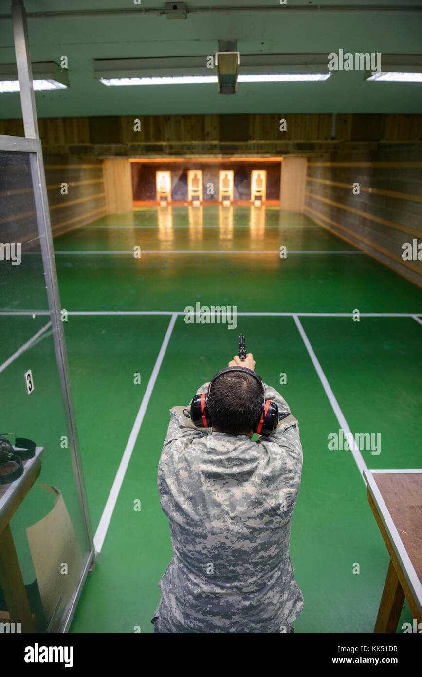 A U.S. Soldier with the 650th Military Intelligence Group fires at his ...