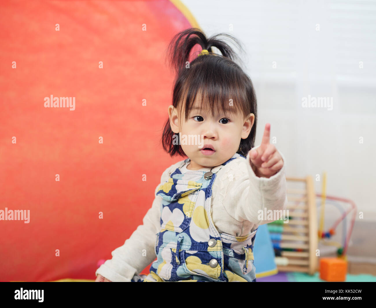 baby girl play toy at home Stock Photo - Alamy