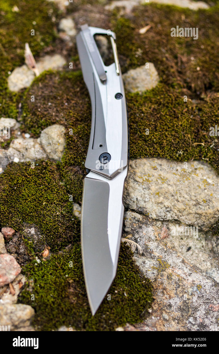 Pocket knife with aluminum handle. Vertical shot Stock Photo - Alamy