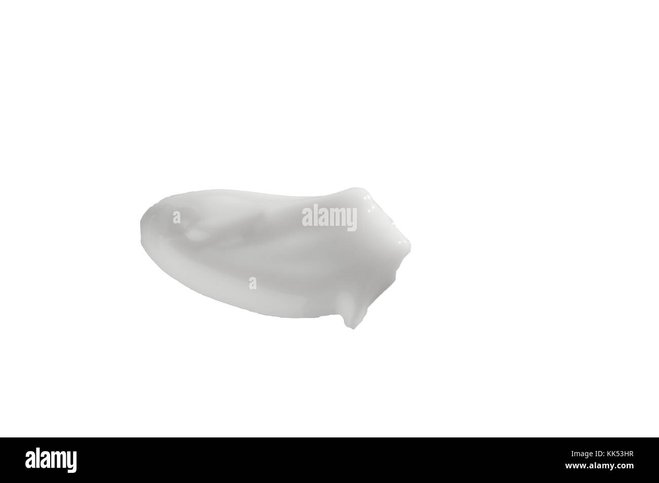 a splash of cream isolated on white background Stock Photo - Alamy