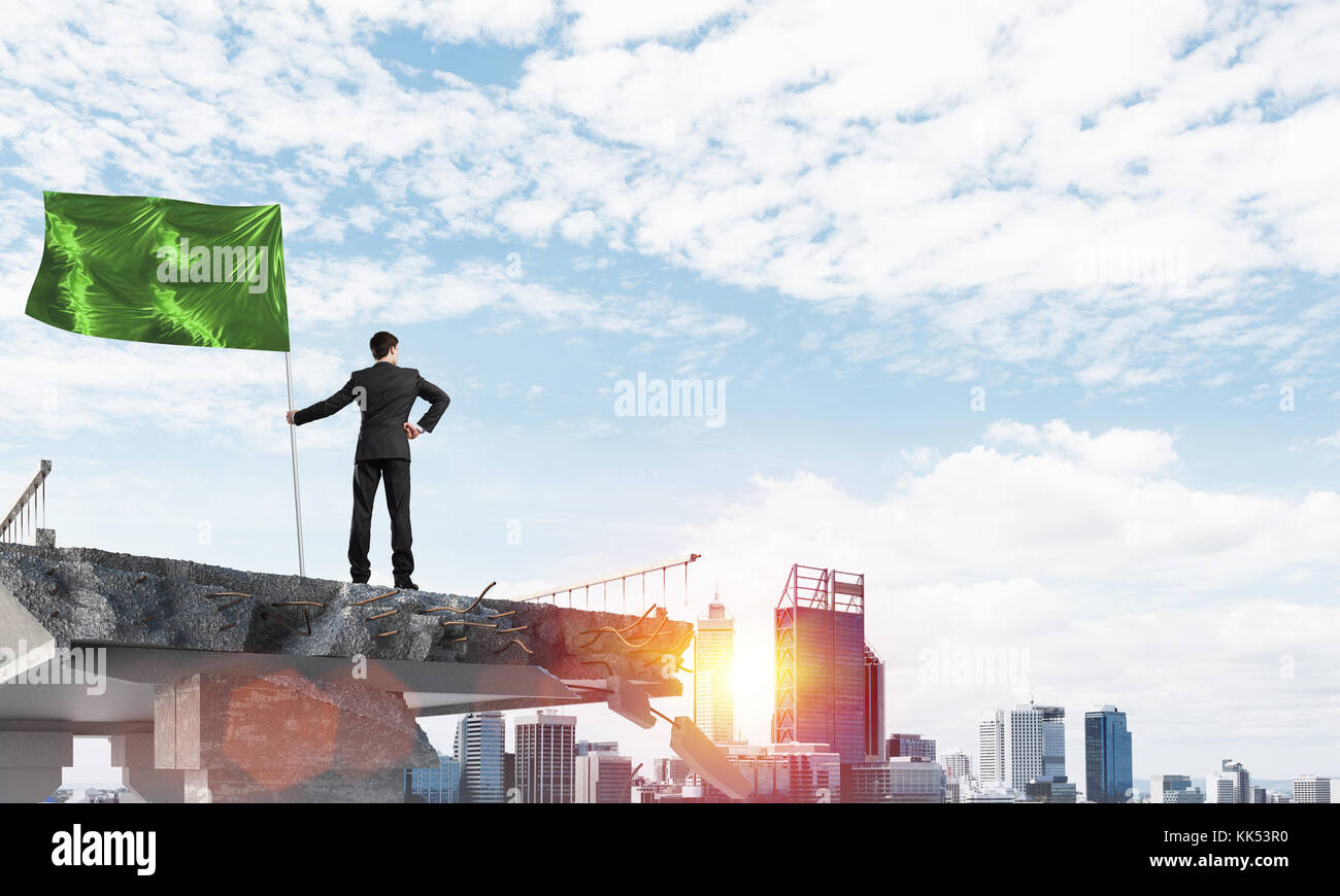 Man with flag presenting leadership concept Stock Photo - Alamy
