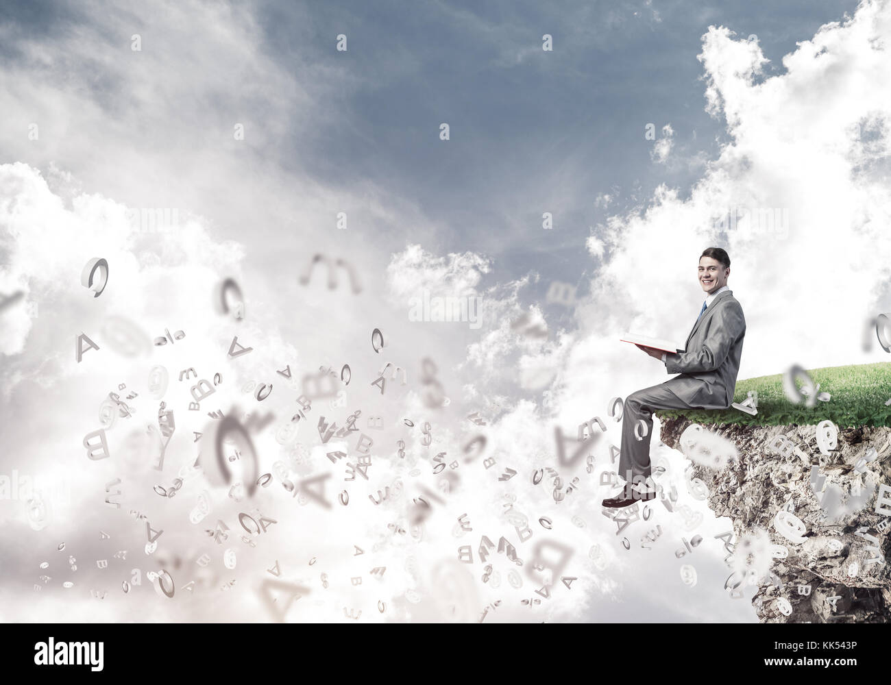 Student guy in suit with book in hands preparing for exam Stock Photo ...