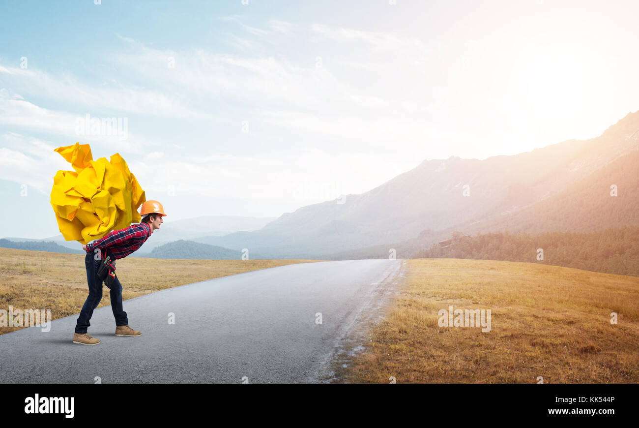 Engineer man carry load Stock Photo - Alamy