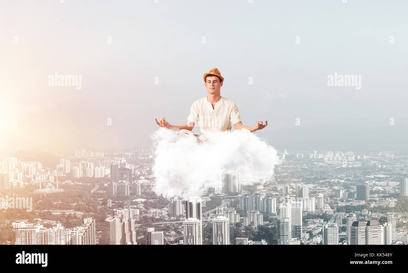 Young man keeping mind conscious Stock Photo - Alamy