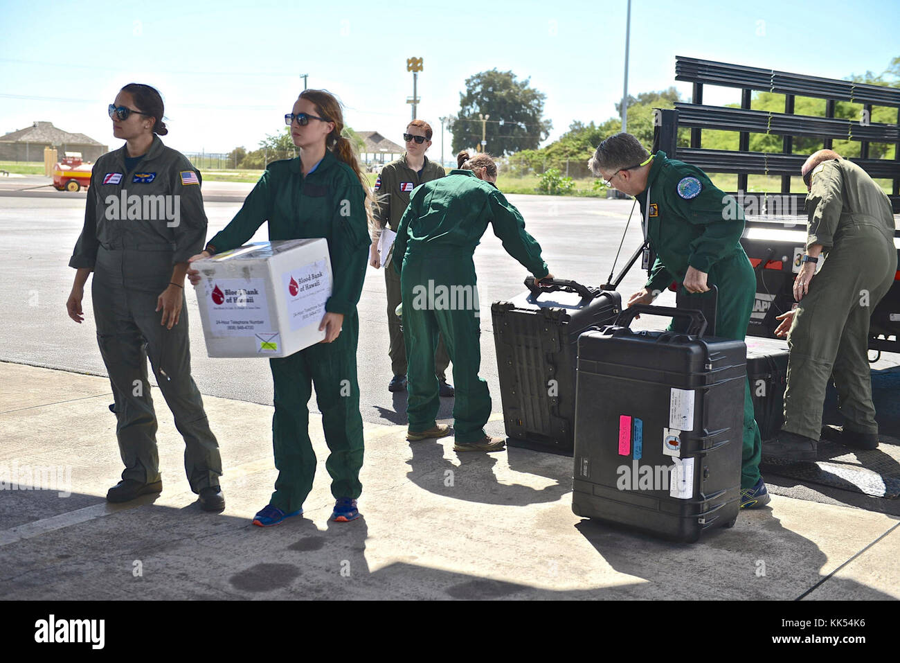 U.S. Coast Guard and Disaster Medical Assistance Team members prepare ...