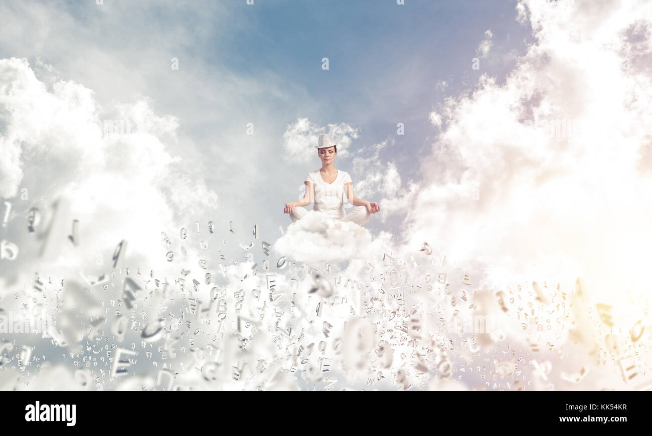 Young woman keeping mind conscious Stock Photo - Alamy