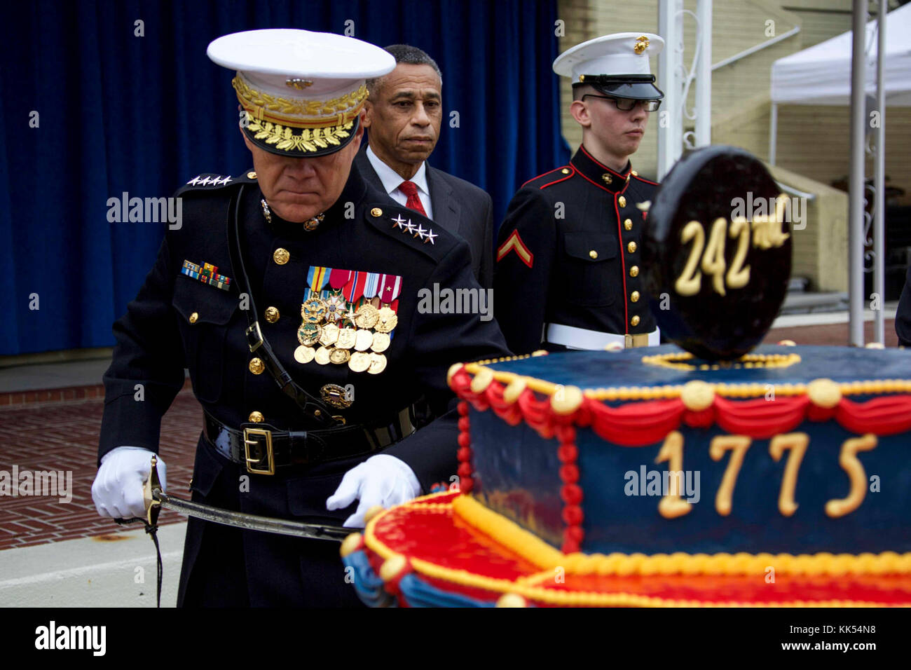 Commandant of the Marine Corps Gen. Robert B. Neller cuts a cake at a ...